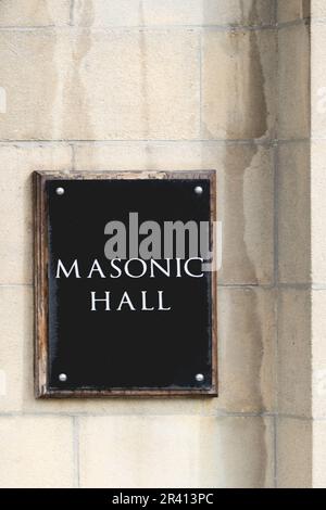 Masonic Hall sign stone plaque on wall, England, UK. Masons meeting ...