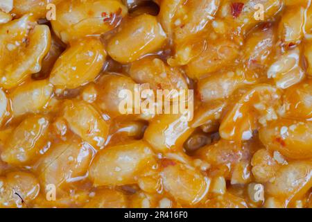 Caramelized nuts fried in honey - granola peanut bar - close up, top ...