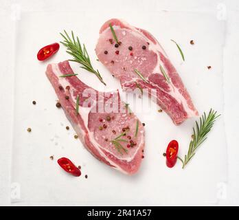 Raw pork loin piece with bone Stock Photo - Alamy
