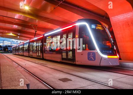 Modern streetcar Alstom Citadis X05 line T9 at the stop Trois Communes ...
