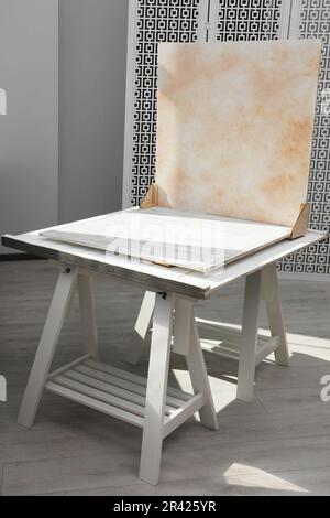 Double-sided backdrop on table in photo studio Stock Photo - Alamy