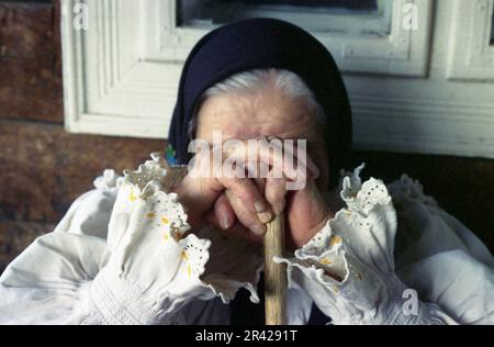 Maramures County, Romania, 2000. Elderly woman wearing traditional ...