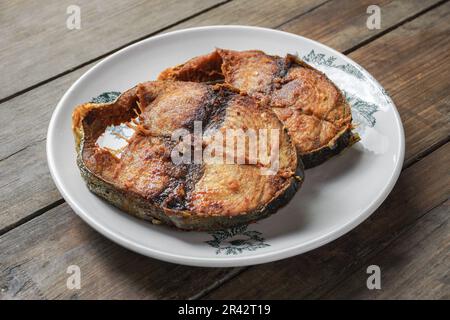 Ikan Tongkol goreng or fried Mackerel Tuna fish. Fried dry with ...