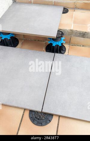 Adjustable plastic studs Support Pedestals swap paving slab tiles Stock ...