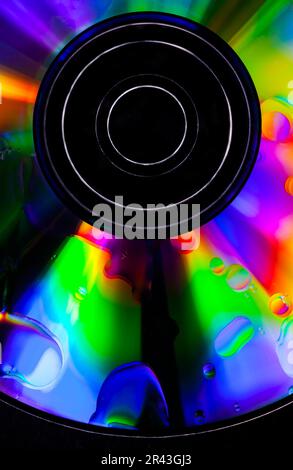 Satured colors for this CD with oil drops on the surface Stock Photo ...