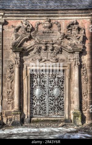 Decorated metal door to the crypt in the old cemetery in Flensburg ...