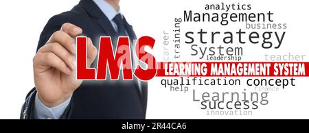 Learning management system. Businessman writing abbreviation LMS on ...