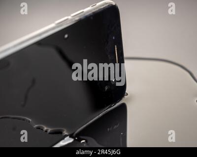 Water has been spilled on the Smartphone. The smartphone fell into the ...