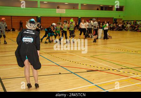 Highly involved Brighton Rockers coach Mass Janeycide at a roller derby ...