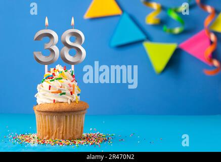 Candle number 38 - Cake birthday in rhodamine red background Stock ...