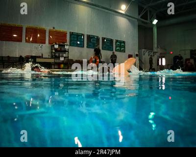 U.S. Marines participate in the “Tarawa Atoll” swimming event during ...