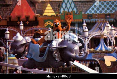 Up in the Air in Fantasyland, Dumbo, Pluto Stock Photo - Alamy