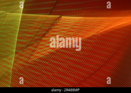 A large display featuring a pattern of red lights radiating outward ...