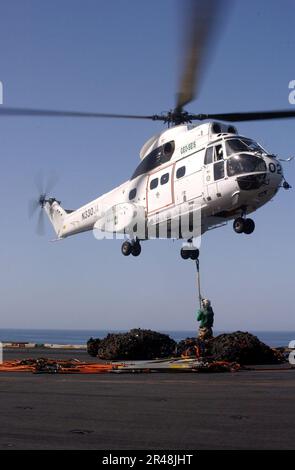 US Navy An SA 330J Puma helicopter, assigned to the Military Sealift ...