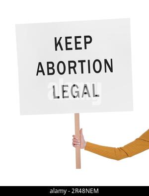 Woman holding placard with phrase Keep Abortion Legal on white ...
