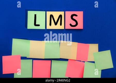 Learning management system. Colorful sticky notes with abbreviation LMS ...