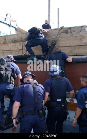 US Navy U.S. Navy boarding team inspects merchant ship in the Arabian ...