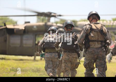 Guatemalan Naval Special Forces board a UH60 Blackhawk with Navy SEAL ...
