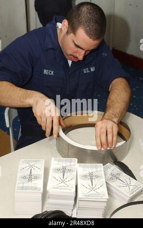 US Navy loading leaflets into canisters Stock Photo - Alamy