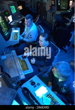 US Navy Air Traffic Controllers man the Carrier Air Traffic Control ...