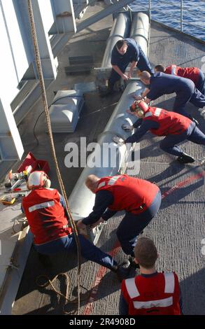 US Navy Fire Controlmen assigned to Combat Systems Department, CS-7 ...