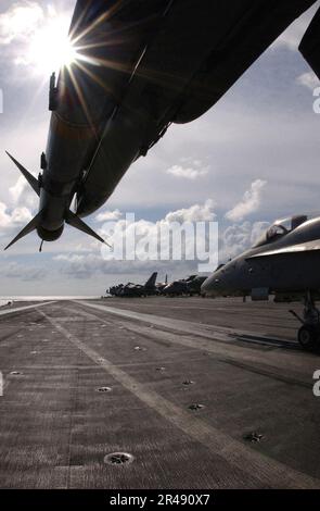 US Navy An F-A-18C Hornet, loaded with a 500-pound GBU-12 laser-guided ...
