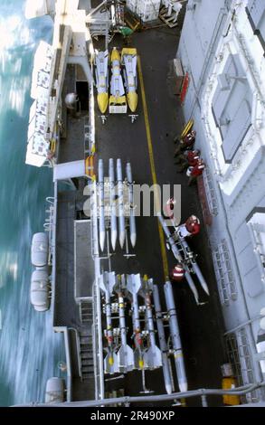 US Navy Ordnance is staged in the hangar bay before being loaded onto ...