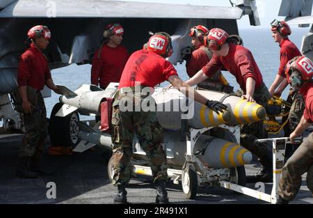 US Navy GBU-31 Joint Direct Attack Munitions (JDAM) are staged in the ...