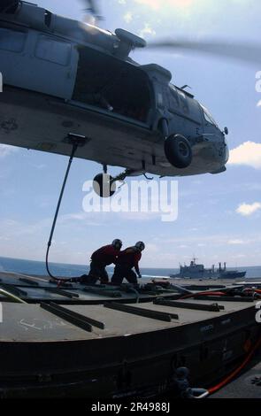 The ammunition ship USS FLINT (AE-32), left background, the frigate USS ...