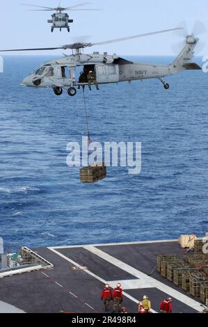 US Navy Two MH-60S Knighthawk helicopters conduct logistic flights ...