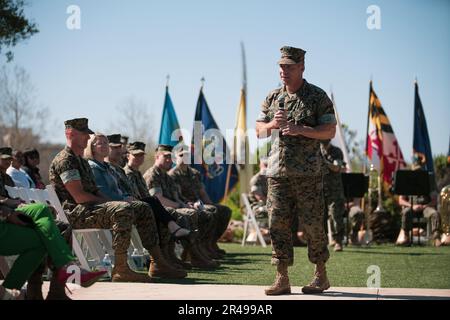 U.S. Marine Corps Col. Sean P. Hoewing, middle, commanding officer of ...