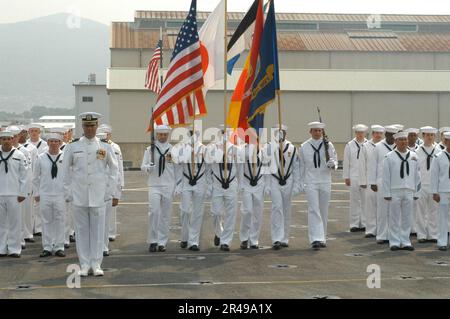 US Navy Color guard parades the colors during a change of command ceremony for Carrier Strike ...