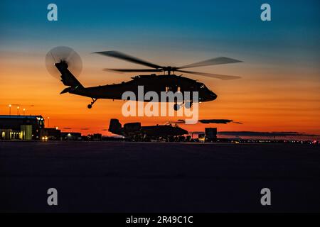 Idaho National Guard pilots take off in UH-60 Black Hawk helicopters on ...