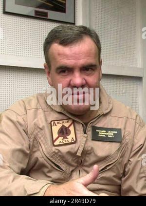 US Navy British Royal Navy Commodore, Richard Leaman, receives a ...