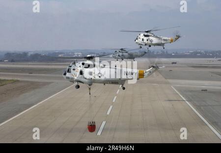 US Navy A UH-3H Sea King helicopter assigned to the Search and Rescue ...