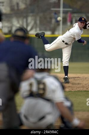 US Navy Midshipman 4th Class fires an M-14 rifle, attached with an MK ...