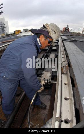 US Navy Civilian ship fitter Philippines, drills in catapult alignments ...