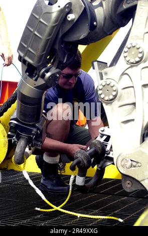 The "Super Scorpio" remote operated vehicle (ROV) is recovered aboard ...