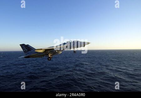 A Fighter Squadron 143 (VF-143) F-14B Tomcat aircraft flies over the ...