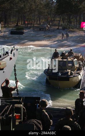 A U.S. Marine lighter amphibious resupply cargo vehicle (LARC-V) moves ...