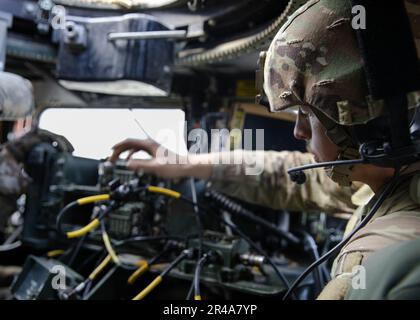 A Soldier with the 45th Infantry Brigade Combat Team, speaks to another ...