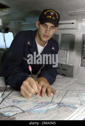 US Navy Quartermaster Second Class Jenny Reid stands her duties as the ...