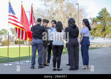 Col. Edgardo Ramirez, commander of the 14th Field Hospital, receives a ...