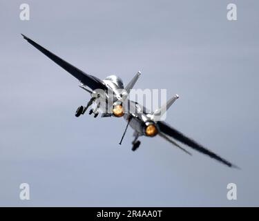 US Navy An F-14D Tomcat takes off in full afterburner after ...