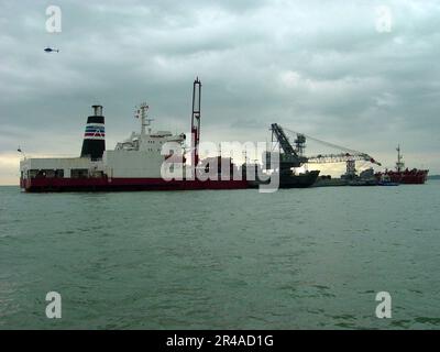 US Navy The MV American Cormorant submerged fifteen feet below the ...