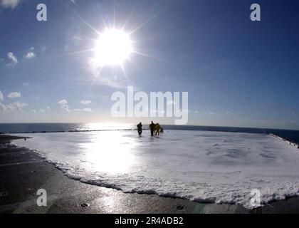 US Navy Sailors check the Countermeasure Washdown System (CMWDS) on the ...