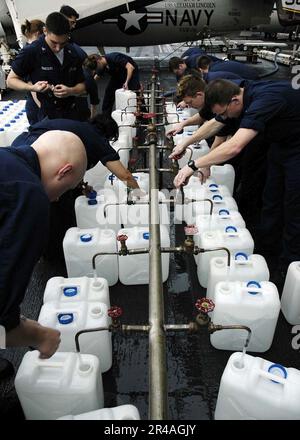 US Navy Sailors assigned to the Reactor Department aboard USS George ...