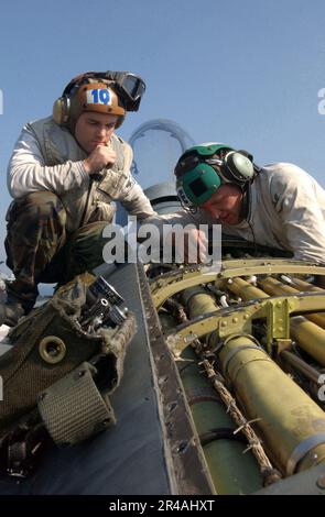 Aviation Electrician's Mate 1st Class Jesse Sabol (left), from ...