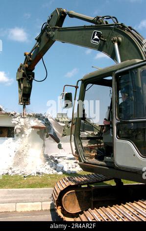 US Navy Equipment Operator 1st Class assigned to Naval Mobile ...