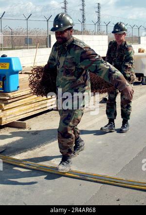 US Navy Steelworker 3rd Class (SW3) Roger Baker, Construction Battalion ...